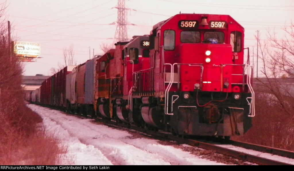 CFE 5597 into the setting sun